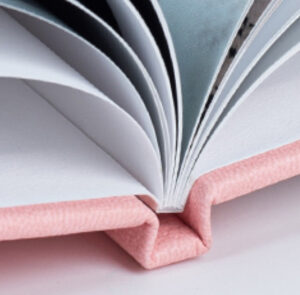 What Are the Different Types of Photobook Binding? Standard Binding vs. Layflat